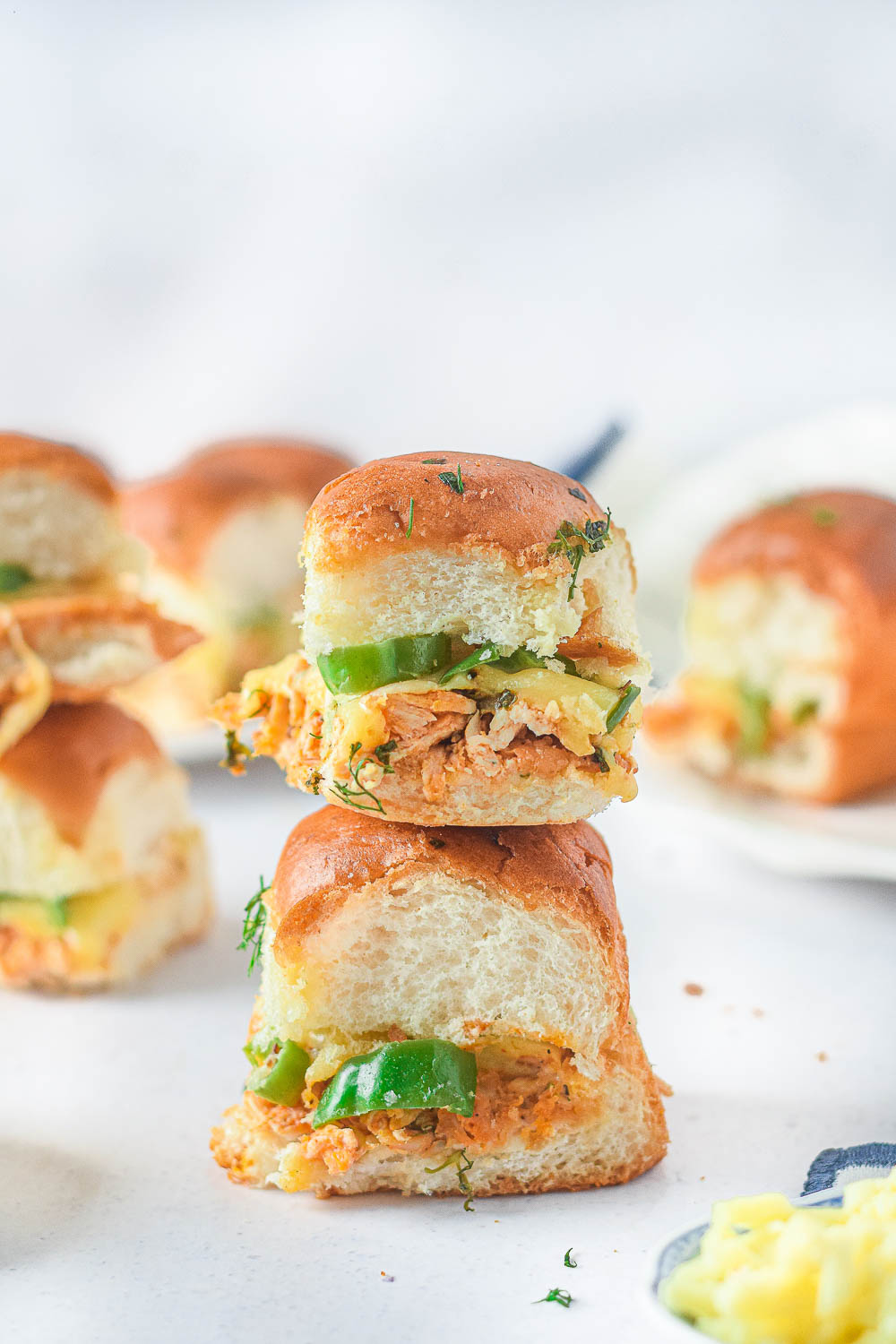 These Buffalo chicken sliders pack the perfect punch of heat!